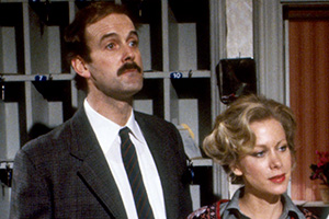 Fawlty Towers. Image shows left to right: Basil Fawlty (John Cleese), Polly (Connie Booth). Credit: BBC
